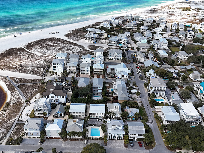 Grayton Beach's homes huddle close to sugar-white sands&mdash;where turquoise waters meet architectural ambition in a postcard-perfect coastal symphony.