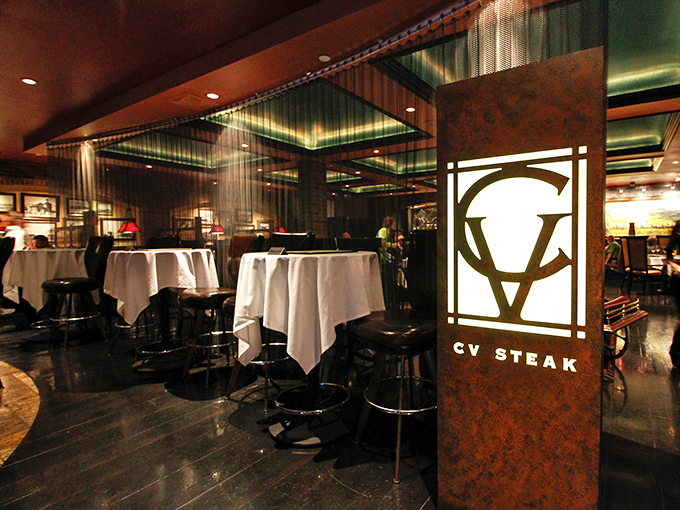 Dark wood and crisp linens signal upscale dining where every steak gets the attention it truly deserves.
