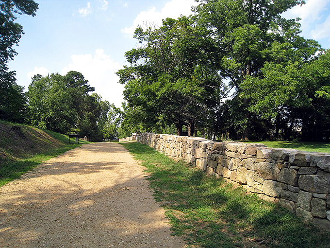Ancient stone walls guide peaceful walks through paths where history feels touchably close.