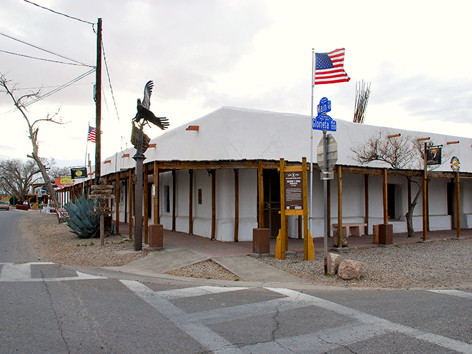 The simple white buildings of San Elizario stand in contrast to the vast blue sky, embodying the minimalist beauty of West Texas.