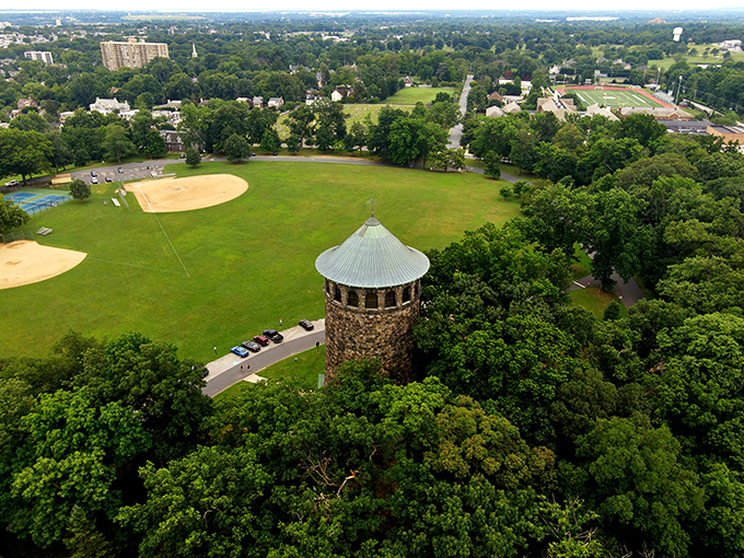 From above, the tower's strategic position becomes clear—a stone sentinel standing guard over Wilmington's green spaces and urban sprawl alike.