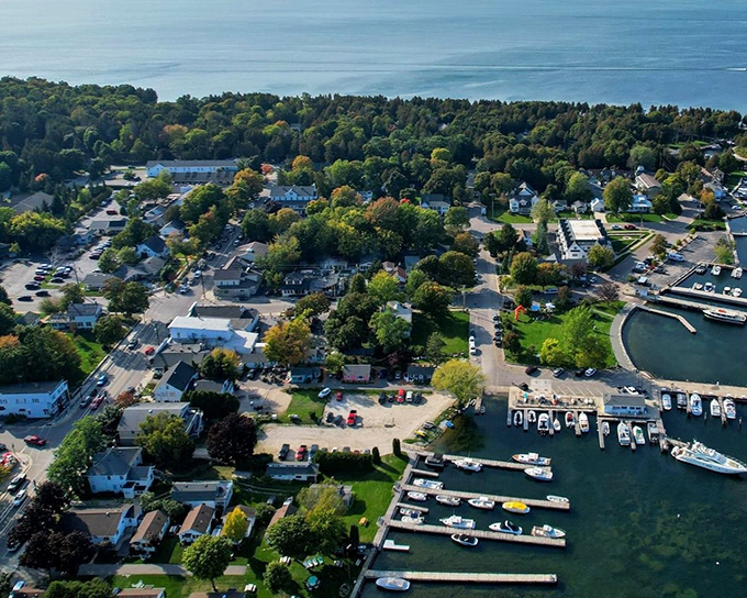 The aerial view reveals Fish Creek's perfect proportions &ndash; a human-scale town where nature still has the upper hand and water meets civilization on equal terms.