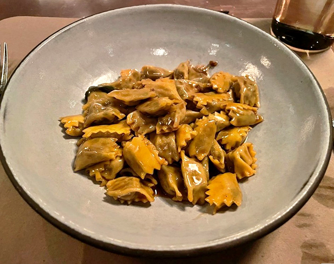 These agnolotti aren't just pasta; they're little envelopes of joy, each one delivering a message of deliciousness directly to your soul.