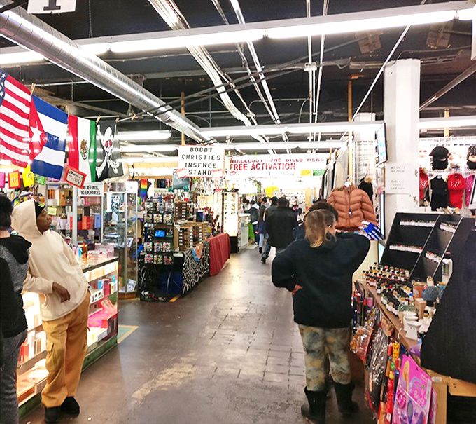 The main artery of commerce, where shoppers navigate the marketplace maze. That ceiling height isn't just architectural&mdash;it's room for dreams to expand.