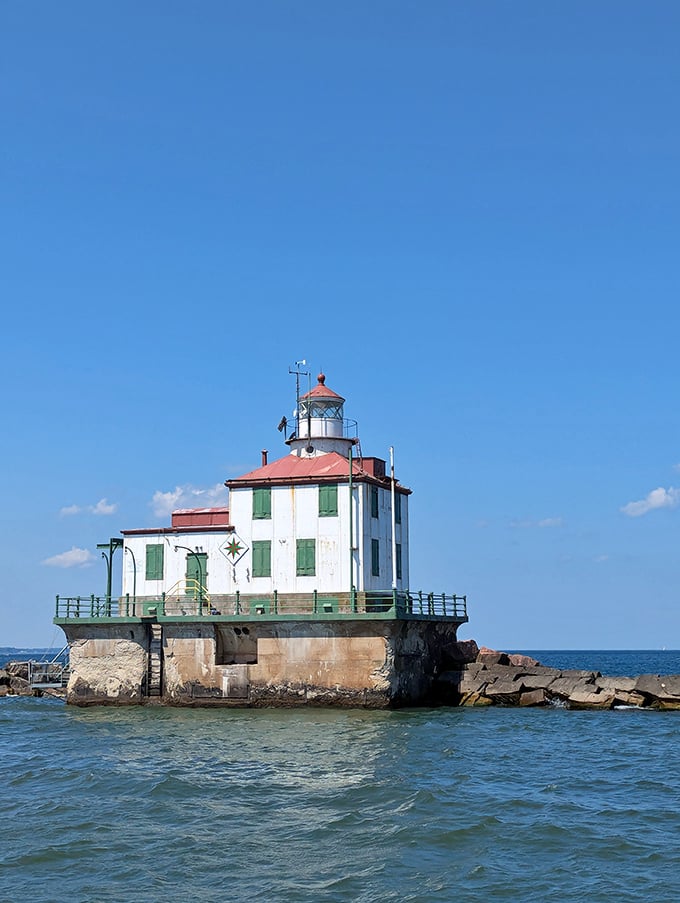 The stalwart Ashtabula Lighthouse stands guard where lake meets sky, a maritime sentinel that's witnessed more dramatic weather than a Midwestern meteorologist.