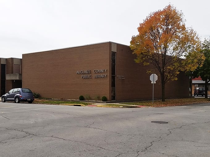 The Auglaize County Public Library stands ready to fuel curious minds. Fall foliage provides a perfect backdrop for this temple of knowledge.