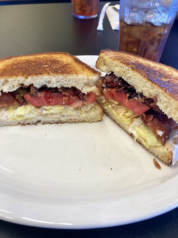 The BLT elevated to art form&mdash;crispy bacon, garden-fresh tomato, and lettuce on perfectly toasted bread, cut to reveal its glorious layers.