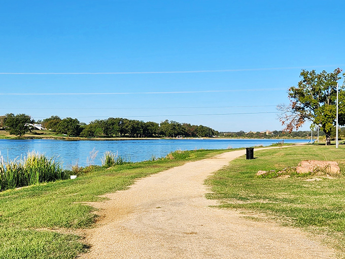 Badu Park's walking path invites contemplative strolls alongside waters that reflect both sky and your suddenly uncluttered thoughts.