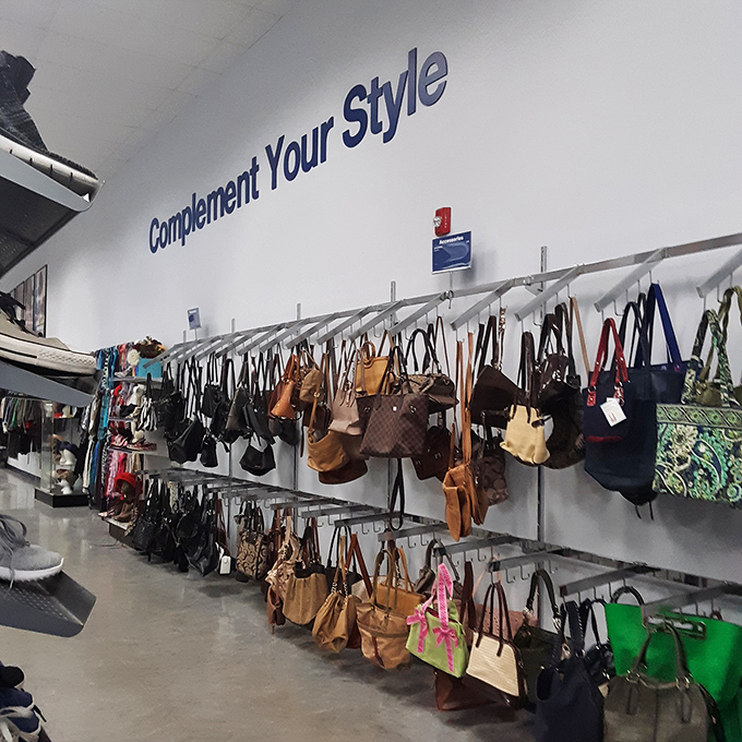 Handbag heaven! Designer lookalikes mingle with authentic vintage pieces in a hanging garden of purses that would make any accessory enthusiast weak at the knees.