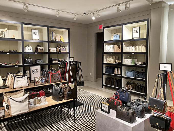 The handbag section: where rational budget planning goes to surrender. Those percentage-off signs are just mathematical justification for why you need a fifth black purse.