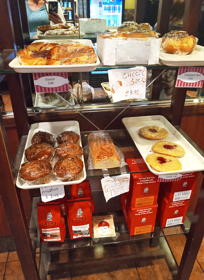 The dessert case&mdash;a glass-enclosed museum of temptation where willpower goes to die and "I'll just have a bite" becomes a beautiful lie.