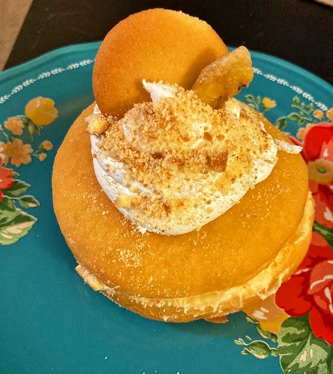 A banana cream pie donut that makes you question why all donuts don't come with cream filling and a vanilla wafer hat.