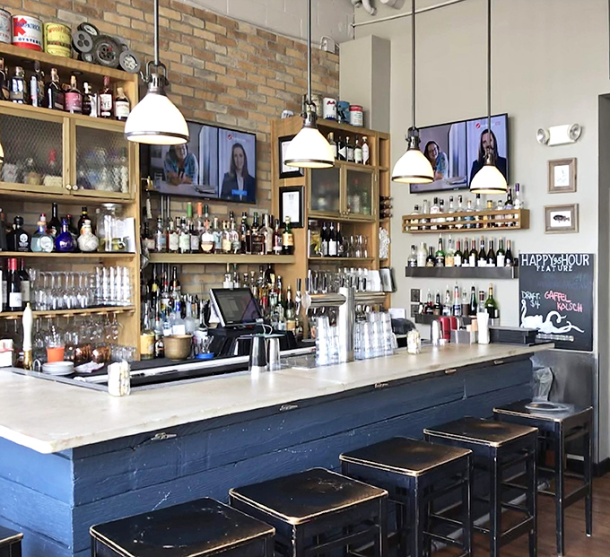 A bar stocked so beautifully it makes you wonder if "bartender" is just another word for "liquid artist with exceptional taste."