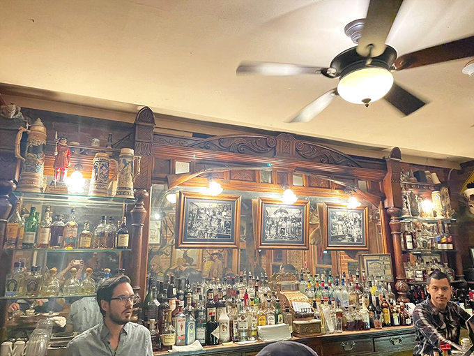 Diners enjoy their meals beneath what might be America's most impressive ceiling of antlers. It's like eating in nature's chandelier showroom.