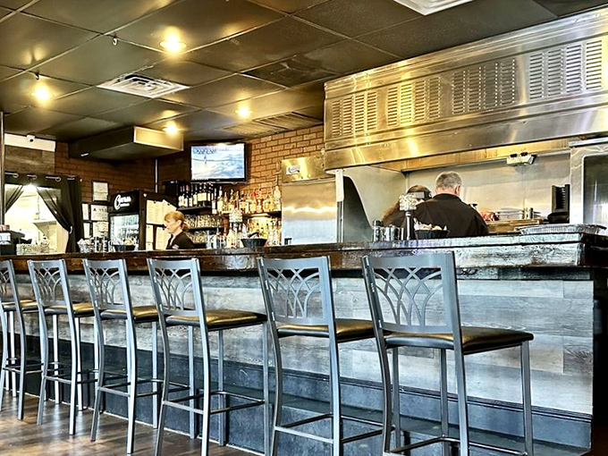 The bar area: where bourbon contemplates its relationship with beef while patrons contemplate their next delicious life decision.