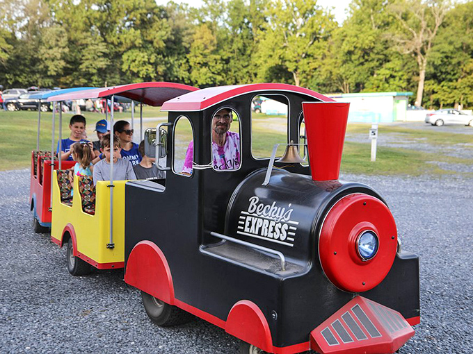 All aboard Becky's Express! This miniature train delights children and triggers nostalgia in adults who remember similar rides.