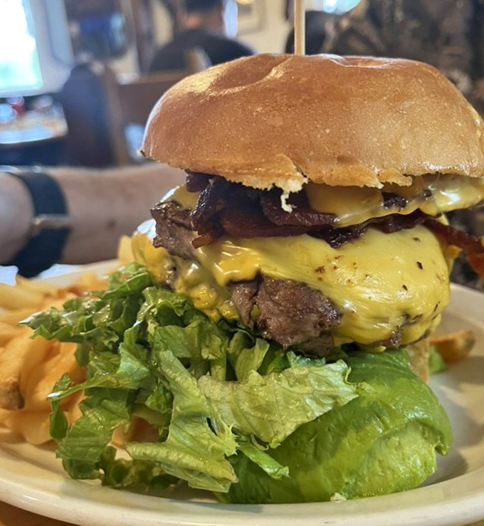 Not so much a burger as a towering monument to carnivorous delight. Bring your appetite and possibly a ladder.