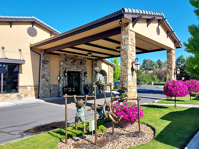 The Best Western Prineville Inn welcomes visitors with bronze children at play, proving small towns understand both hospitality and public art.