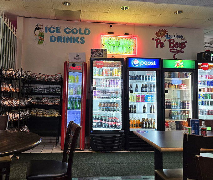 The beverage wall glows with promise&mdash;a rainbow of sodas, beers, and Louisiana favorites that wash down spicy Cajun fare with refreshing precision.