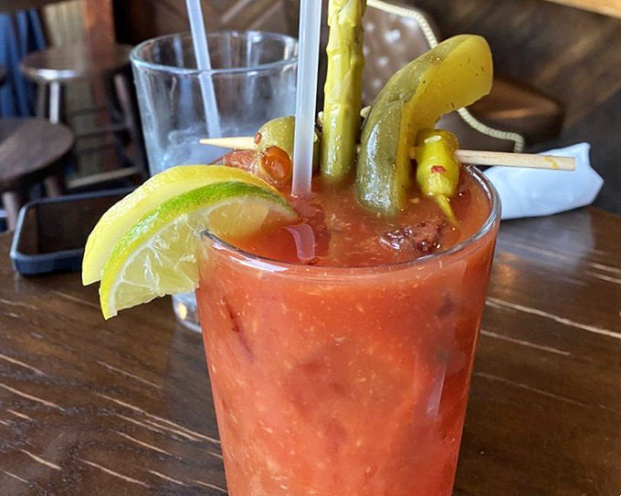 This Bloody Mary isn't just a drink; it's a meal in a glass! Garnished to the nines, it's like a garden party and a cocktail had a delicious baby. 