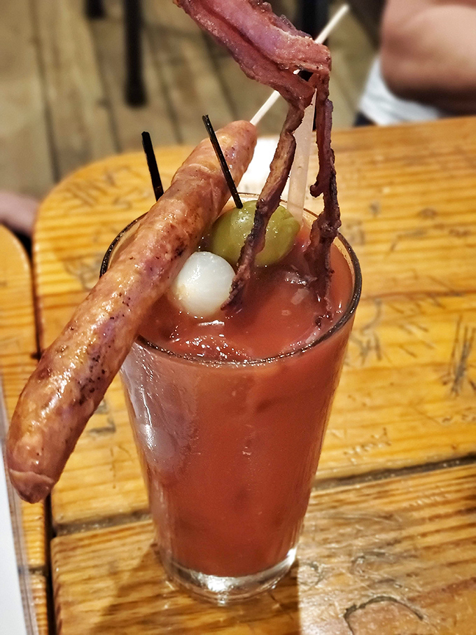 This Bloody Mary isn't just a drink&mdash;it's breakfast, lunch, and a dare all in one glass. The meat garnish alone deserves its own zip code.