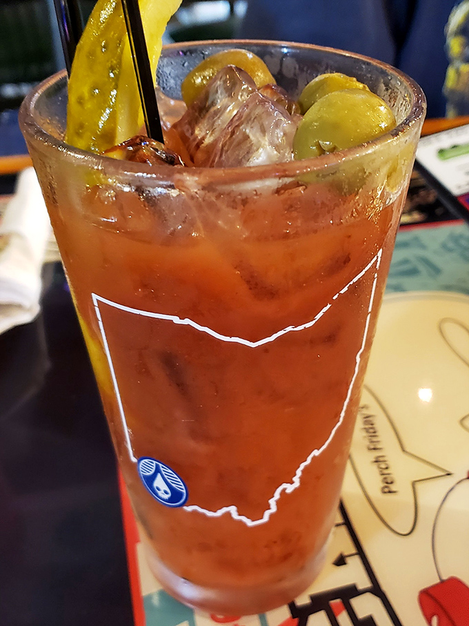 Ohio pride in liquid form! This Bloody Mary with its state-shaped garnish proves that great cocktails don't need big-city zip codes to deliver big-time flavor.