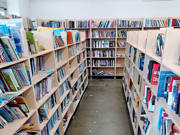 The book section—a library without late fees where paperback romances and hardcover classics await their next reader's imagination.