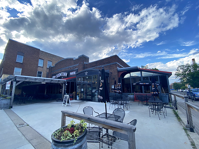 BoomTown Brewery combines industrial-chic aesthetics with outdoor seating, bringing craft beer culture to the heart of mining country.