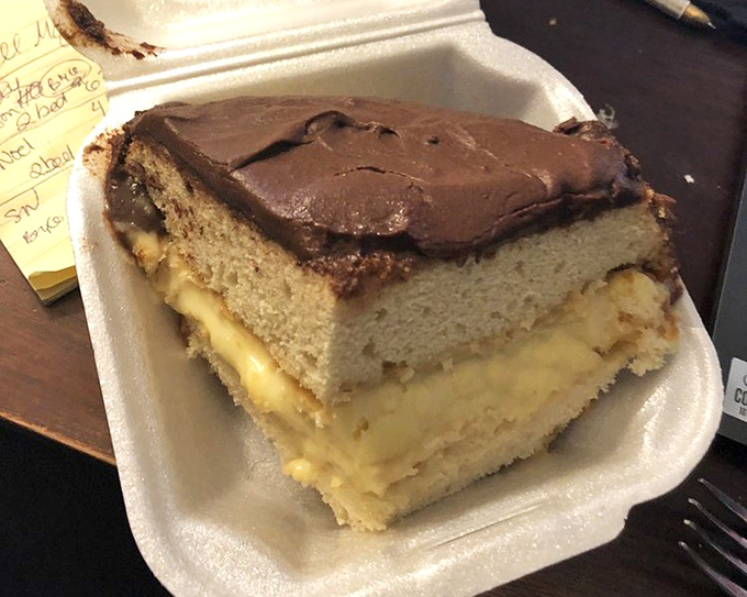Boston cream pie that would make a Bostonian weep with joy. That chocolate frosting is spreading happiness one slice at a time.