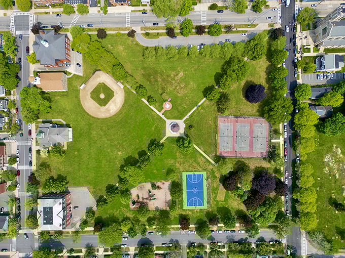 This aerial view of Bristol's community green space reveals the heart of small-town life &ndash; baseball diamonds, basketball courts, and room to breathe.