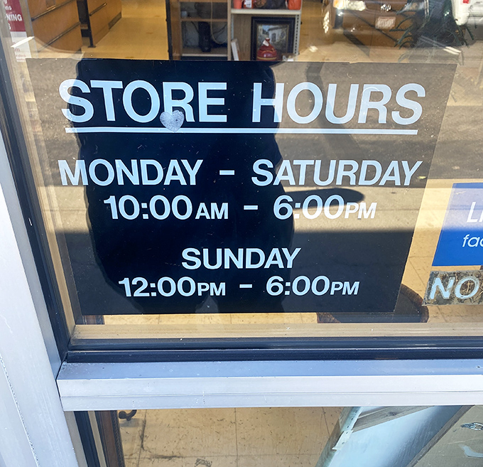 The store hours sign&mdash;memorize these numbers like lottery combinations if you want to strike secondhand gold in Fairfield.