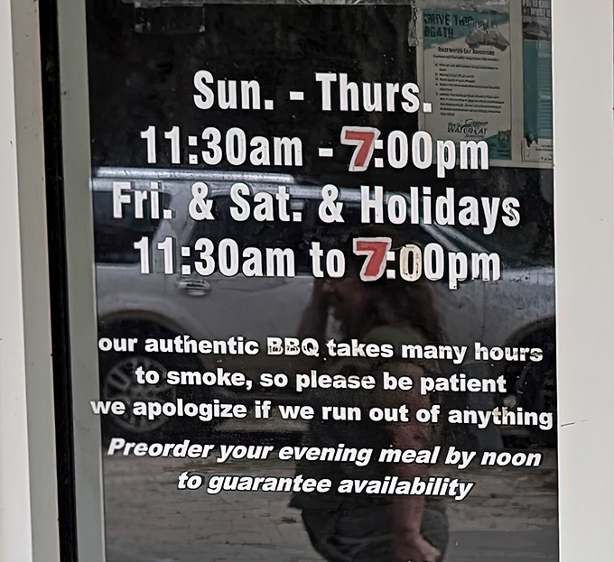 The hours sign tells the truth: authentic BBQ takes time. When they're out, they're out – a warning and a challenge.
