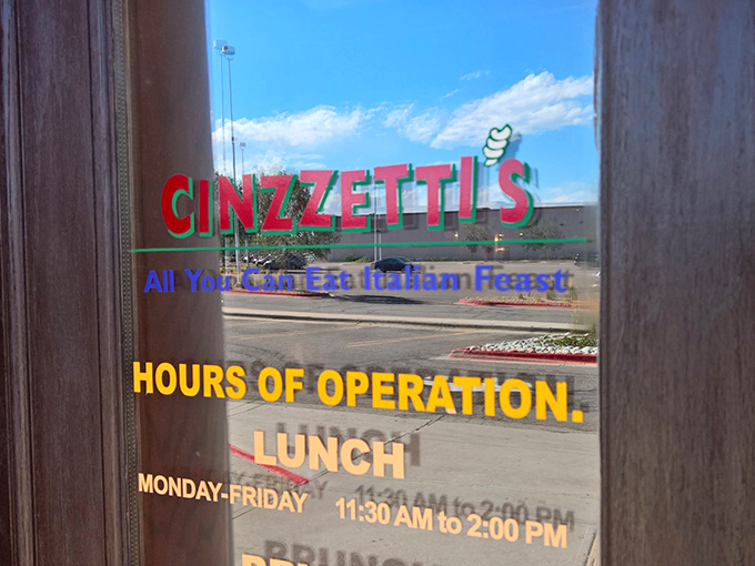 The door tells the truth: "All You Can Eat Italian Feast." Four words that have launched a thousand food comas.