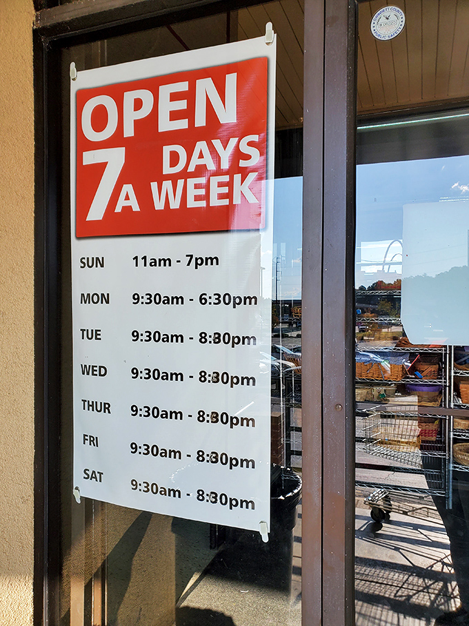 Seven days a week of thrifting possibilities&mdash;the store hours sign that proves bargain hunting can fit any schedule. Tuesday night shopping spree, anyone?