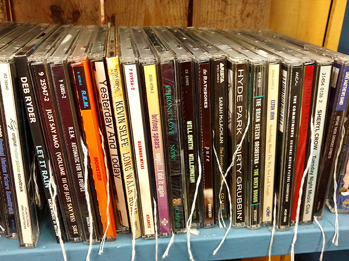 A rainbow of CD spines showcases musical history from Deb Norder to Hyde Park. Physical albums &ndash; where album art and liner notes were as important as the music.
