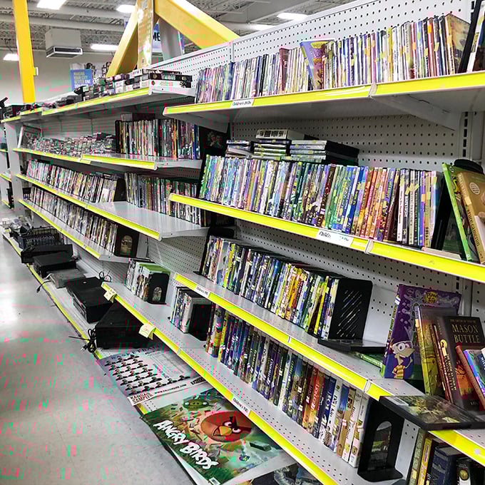 The media aisle—where DVDs and CDs wait patiently for collectors who still appreciate physical media. That copy of "Titanic" has survived longer than the actual ship.