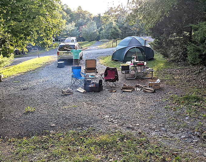 Camping: where "setting up your mobile office" means arranging folding chairs around a fire pit instead of finding the nearest coffee shop outlet.