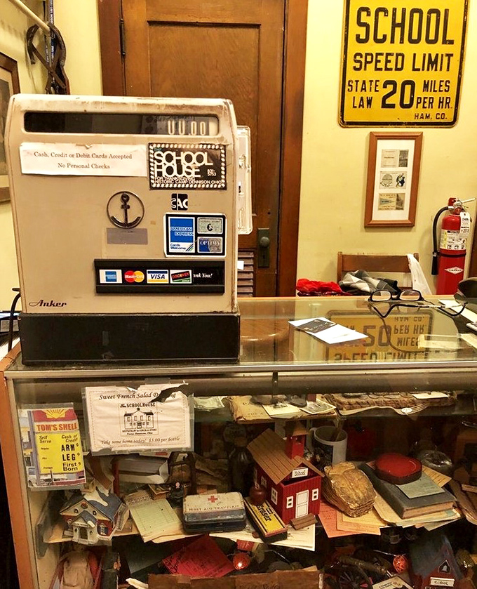 Even the cash register has earned its tenure, surrounded by school-themed memorabilia that reminds you this A+ meal was once someone's arithmetic lesson.