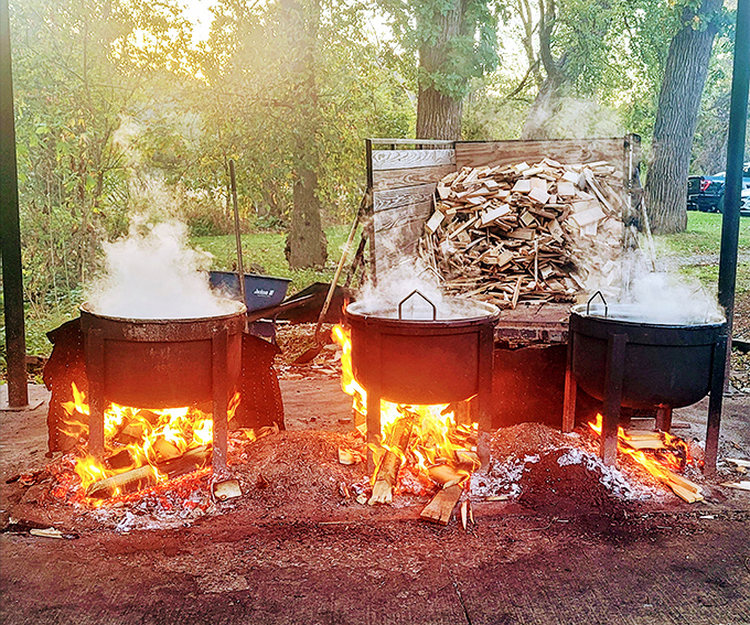 Bubbling cauldrons over open flames reveal the primal cooking methods behind Fitzgerald's legendary fish boil—a spectacle for both eyes and appetite.