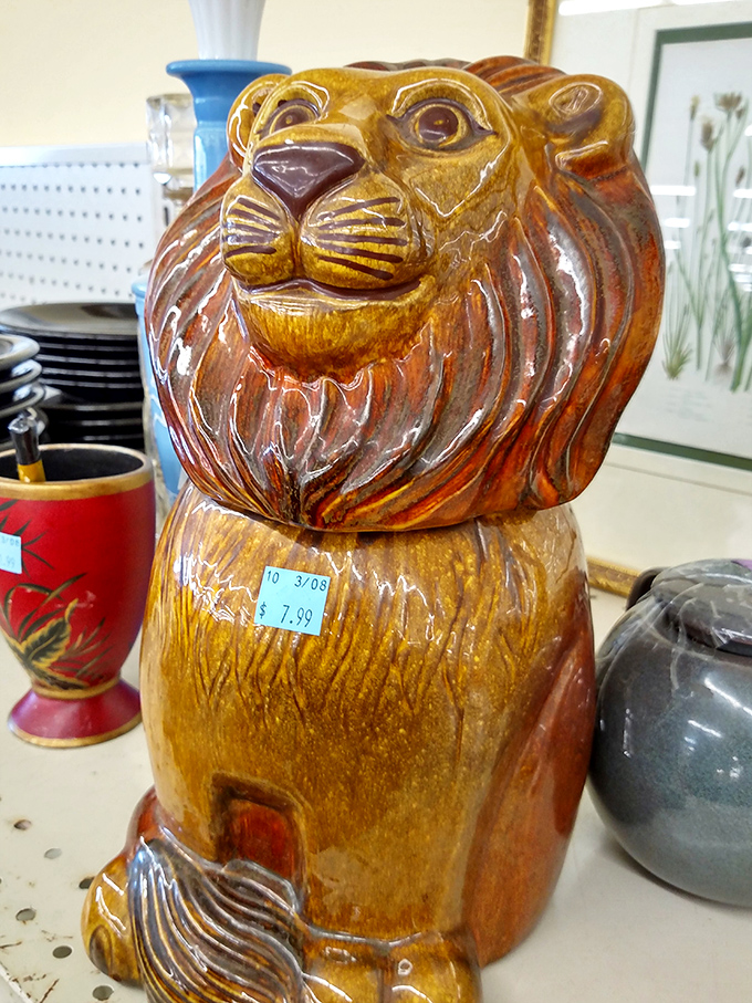 This ceramic lion figurine has seen things. Now he's ready to guard your bookshelf with the same stoic dignity he's maintained for decades.