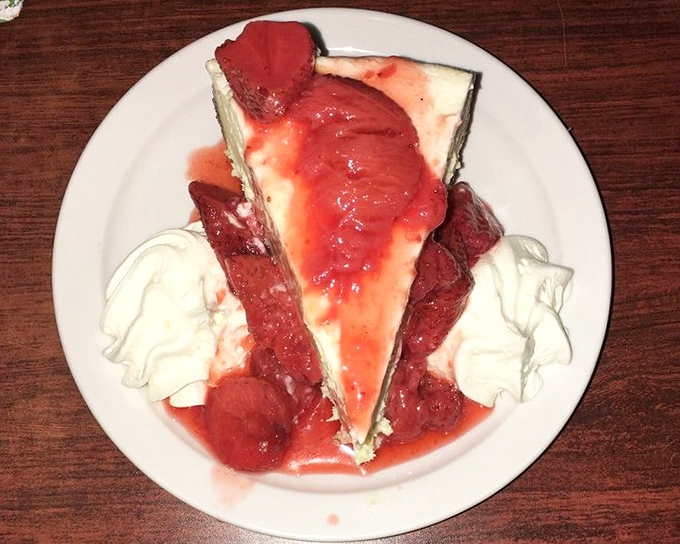 Strawberry cheesecake that makes dieting feel like a concept from another dimension. Those berry-topped slices aren't just dessert&mdash;they're the grand finale your meal deserves.