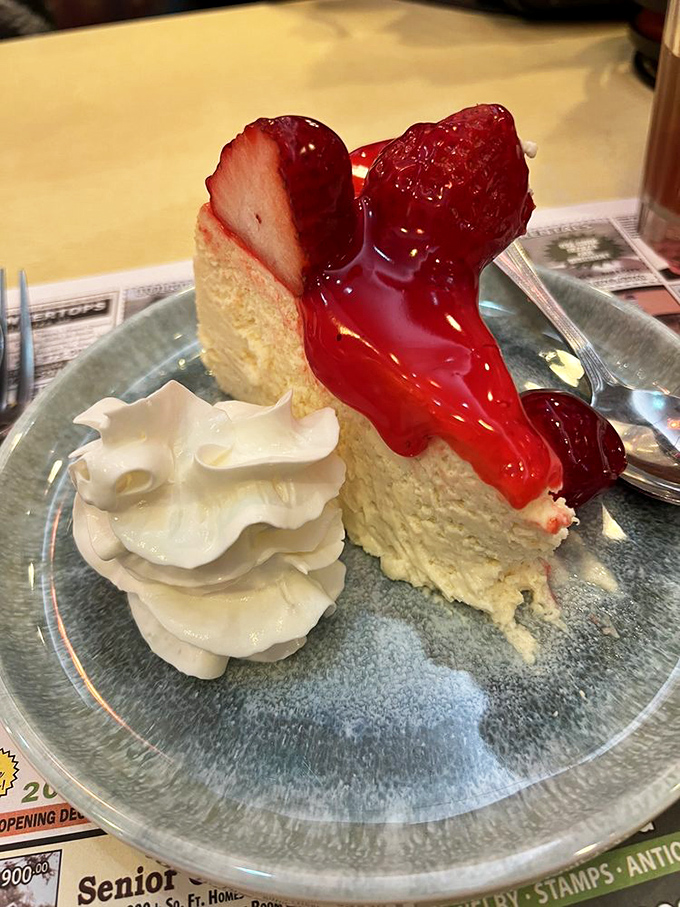 Strawberry cheesecake that makes you understand why people write songs about dessert. That whipped cream swirl deserves its own Instagram account.