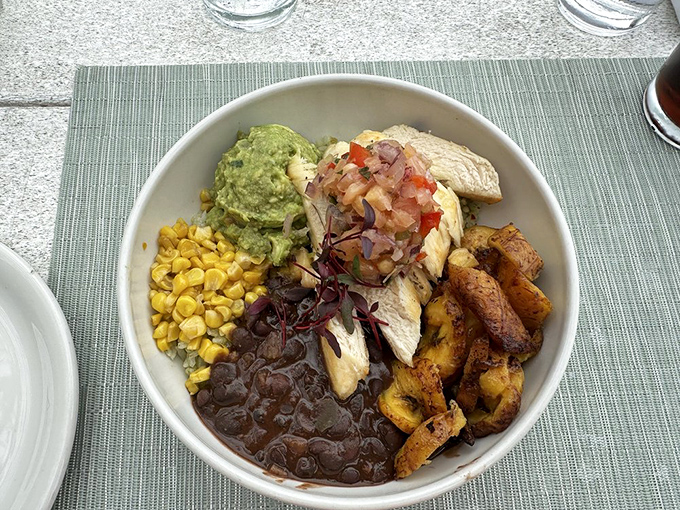A bowl built for satisfaction&mdash;grilled chicken, black beans, sweet corn, and plantains create a Caribbean-inspired flavor fiesta.