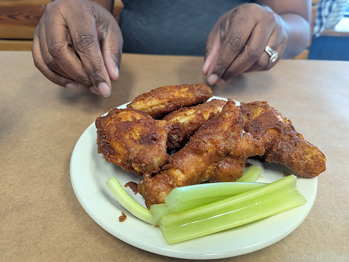 These chicken wings might seem like seafood sacrilege at a crab house, but one bite explains their rightful place on the menu.