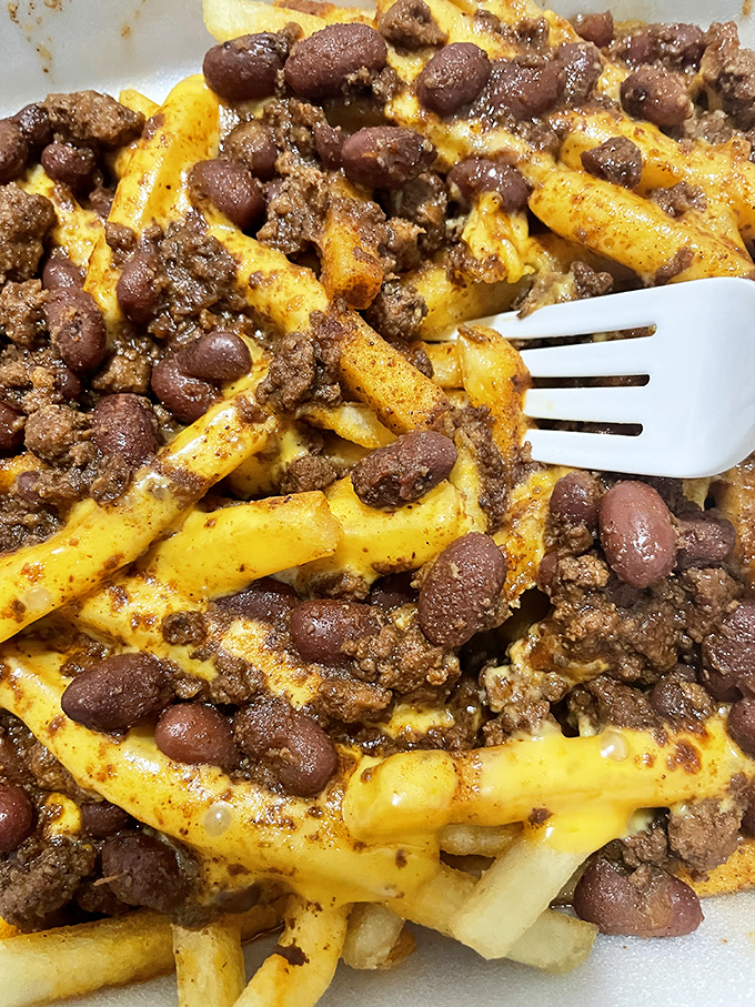 Chili cheese fries: where excess meets necessity. This glorious mess of beef, beans, cheese and potatoes is the comfort food equivalent of a bear hug.
