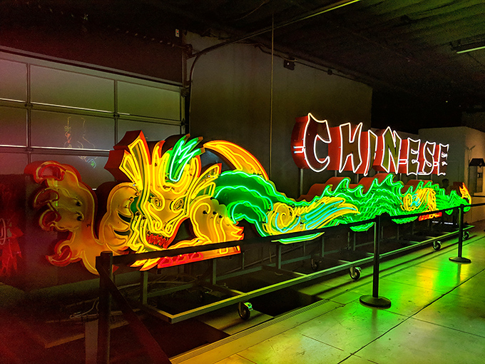 This spectacular Chinese dragon sign writhes with electric energy, demonstrating how neon transcended language barriers to become a universal visual language.
