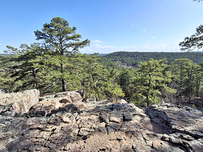 Standing atop these ancient rocks gives you perspective on both the landscape and your own tiny place in geological time.