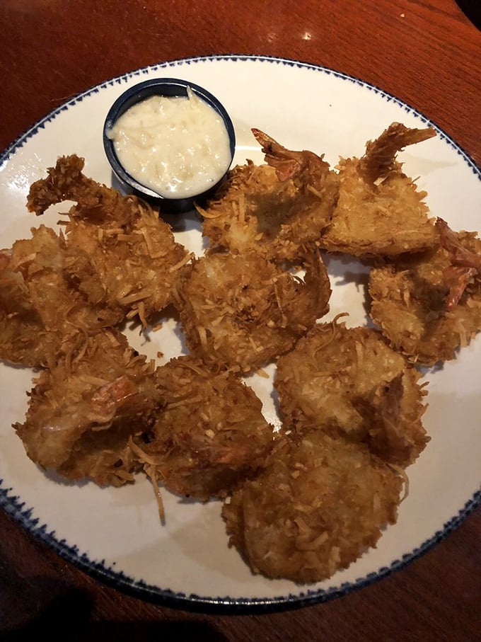 Coconut shrimp: tropical vacation on a plate. The crispy, sweet exterior gives way to perfectly cooked shrimp &ndash; paradise found in Nebraska.