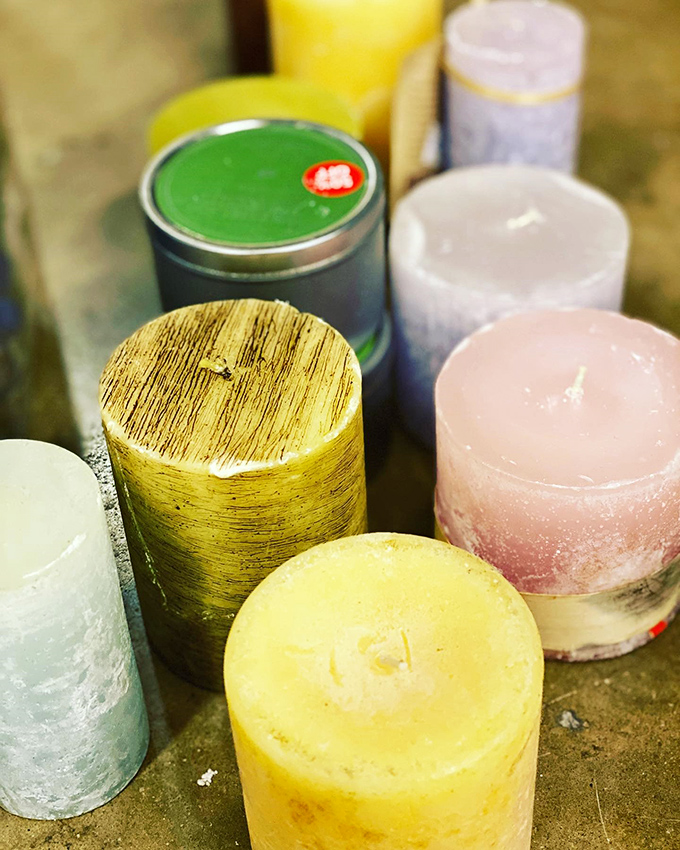 Candles in every hue&mdash;because nothing says "I'm an adult" like decorative wax you'll probably never light. Instant ambiance for the commitment-phobic decorator.
