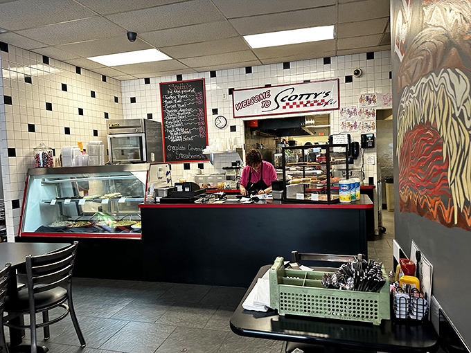 The welcoming counter area with its handwritten specials board is where the magic happens&mdash;where orders are called and comfort food dreams come true.